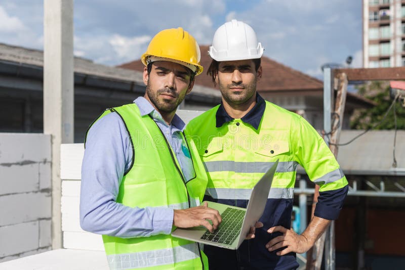Professional Construction Engineer Team, Two Man Engineer Wear Uniform ...