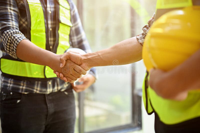 Professional Construction Engineer or Worker Shaking Hands with His ...