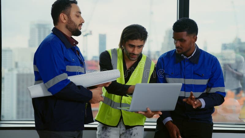 Professional Construction Engineers Using Blueprint Brainstorming Stock ...