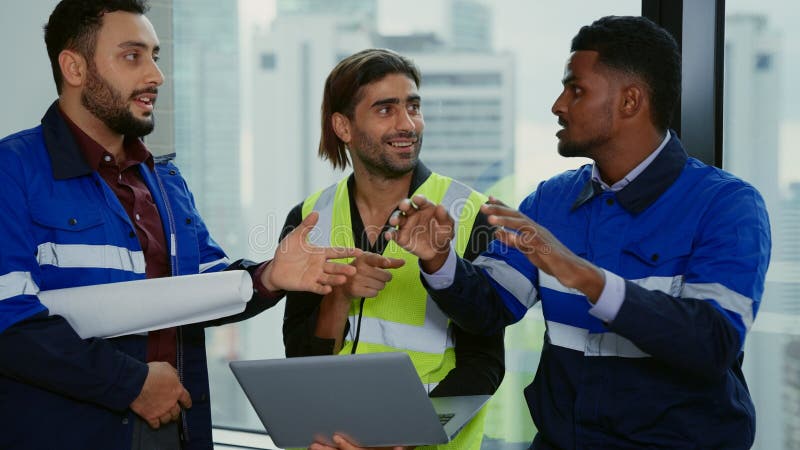 Professional Construction Engineers Using Blueprint Brainstorming Stock ...