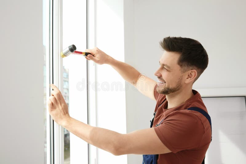Professional Construction Worker Installing Plastic Window Stock Image ...