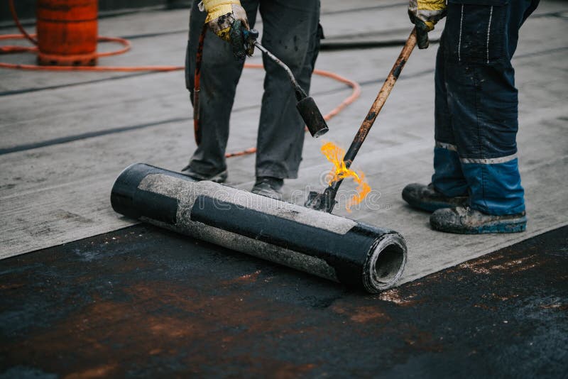 Professional Construction Worker Installing and Waterproofing House ...
