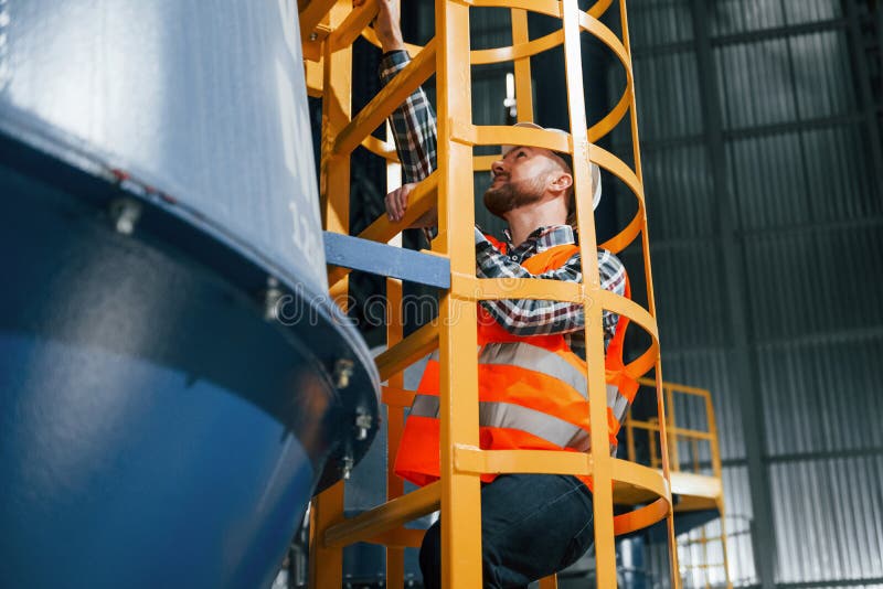 Professional Construction Worker in Uniform is in the Factory Stock ...