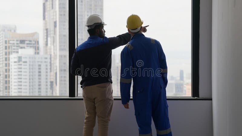 Professional Construction Workers Using Tablet Brainstorming and ...