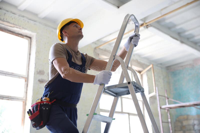 Professional Constructor on Ladder in Old Building Stock Image - Image ...