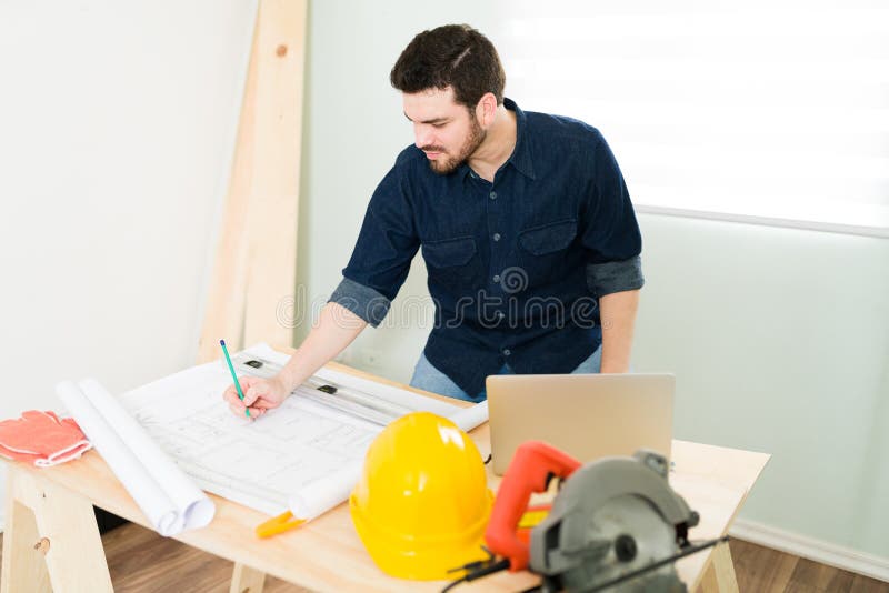 Professional Contractor with Blueprints Stock Photo - Image of adult ...
