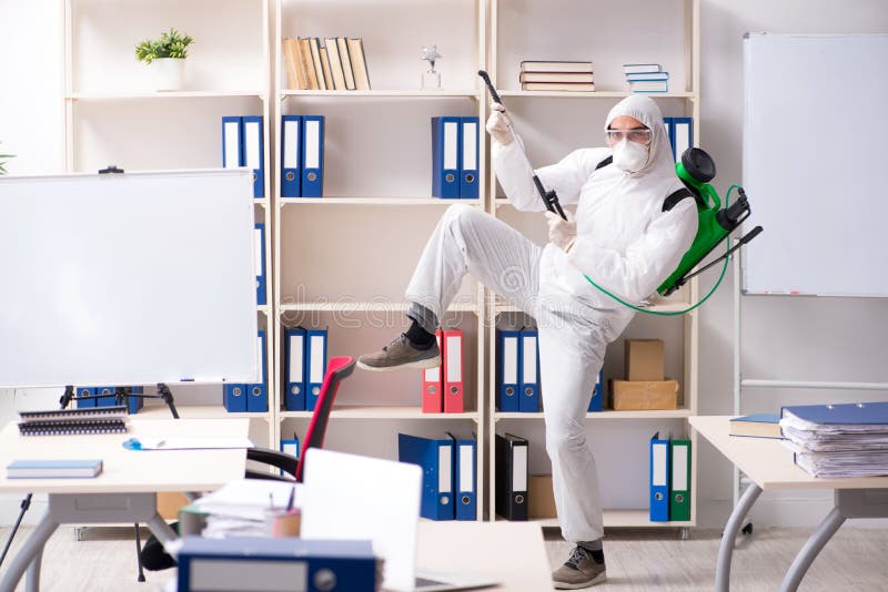 The Professional Contractor Doing Pest Control at Office Stock Image ...