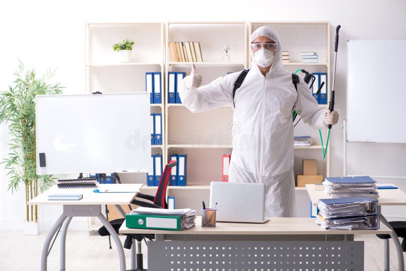 The Professional Contractor Doing Pest Control at Office Stock Image ...