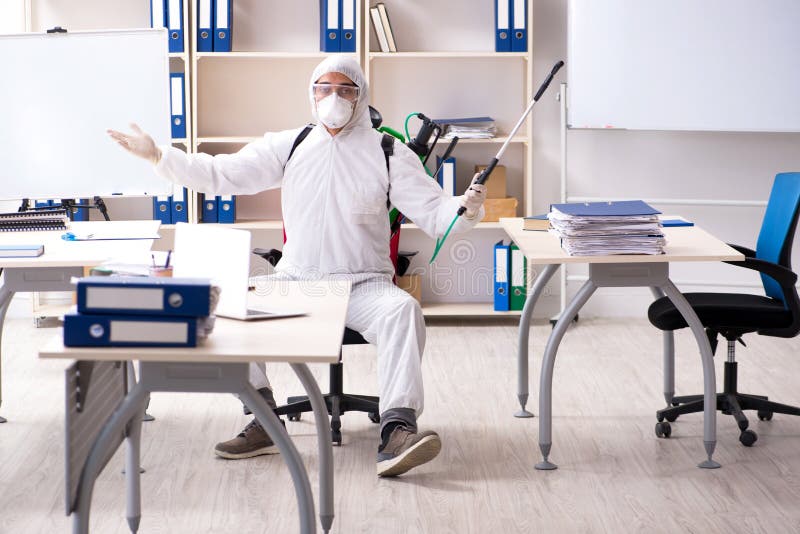 The Professional Contractor Doing Pest Control at Office Stock Image ...