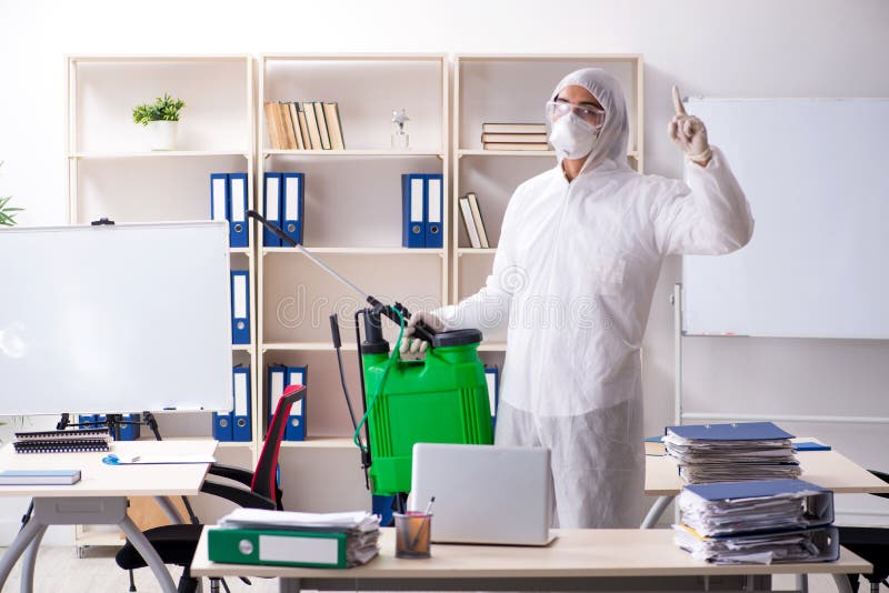 The Professional Contractor Doing Pest Control at Office Stock Image ...