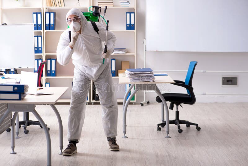 The Professional Contractor Doing Pest Control at Office Stock Image ...