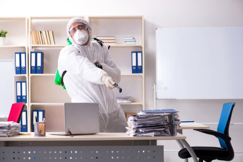 The Professional Contractor Doing Pest Control at Office Stock Photo ...