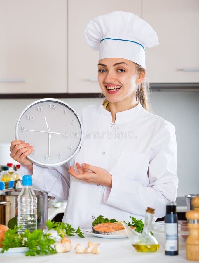 Female Chef Counting Time Down for Cooling Fish Stock Image - Image of ...