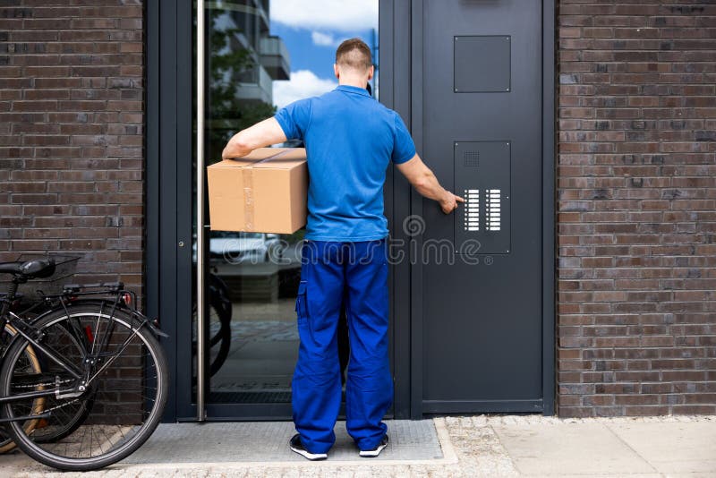Professional Courier Ensuring Secure Package Deliveries by Stock Photo ...