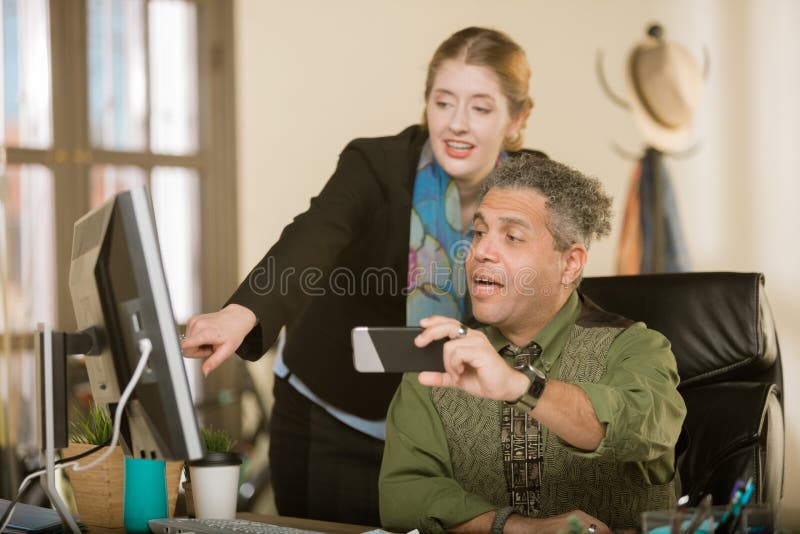 Confident Creative Woman and Man Working at Computer Stock Image ...