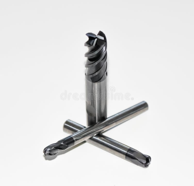 Professional Cutting Tools. Three Carbide End Mills of Different Types ...
