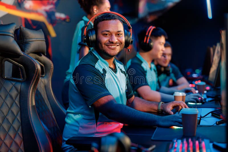 Cheerful Gamer Participates in Team Play in Cyber Club Stock Photo ...