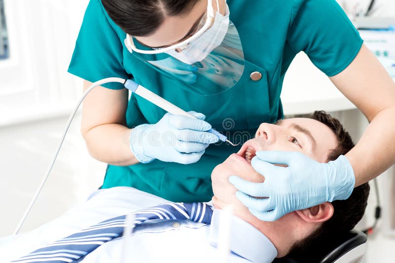 Professional Dentist Doing Teeth Checkup Stock Photo - Image of ...