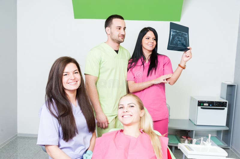 Professional Dentist Team and Happy Patient Stock Photo - Image of ...