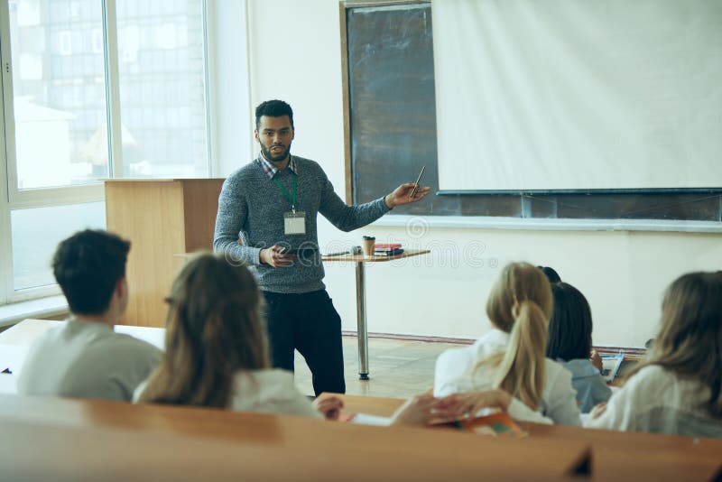 Professional Development Workshop. Young Man, Tutor Leading Workshop ...