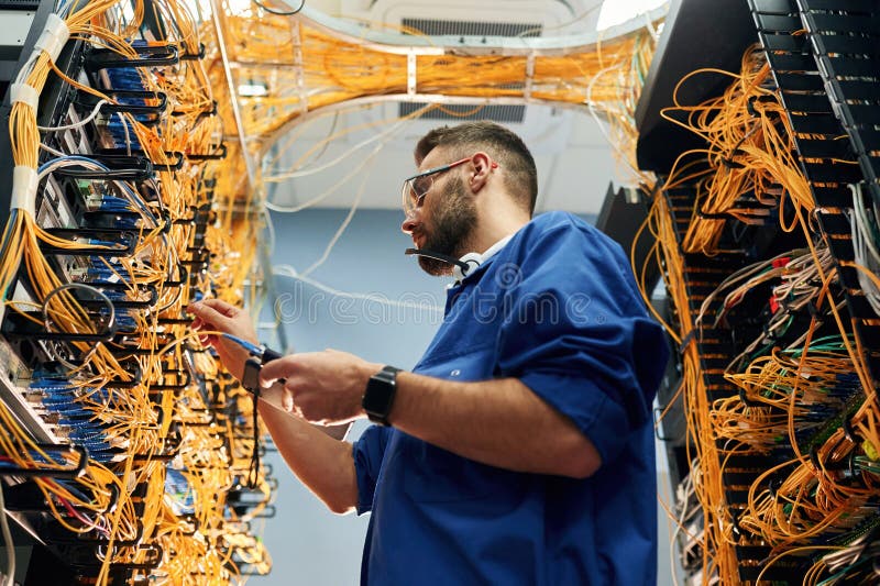 Professional Device in Hands. Young Man is Working with Internet ...