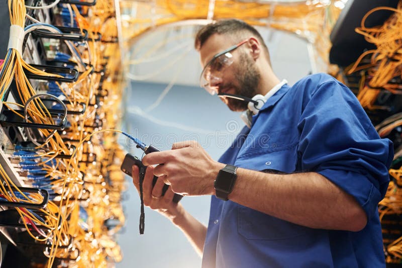 Professional Device in Hands. Young Man is Working with Internet ...