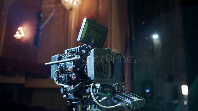 Professional Digital Cinema Camera with Set of Light Hanging in Studio ...