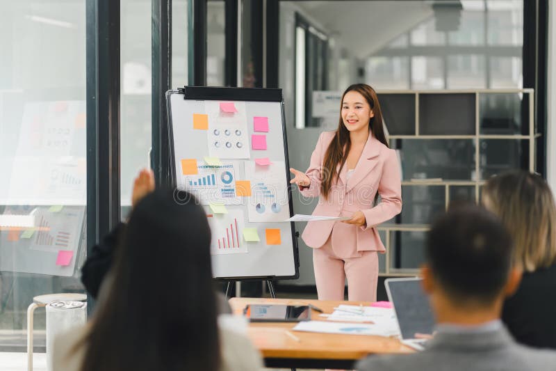 Professional Diverse Business Team Presenting and Discussing Data ...