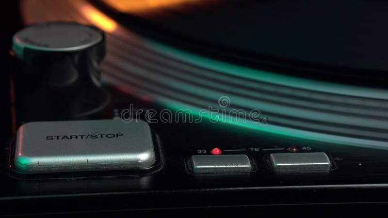 Professional DJ Turntable, Start and Stop Button and Spinning Vinyl ...