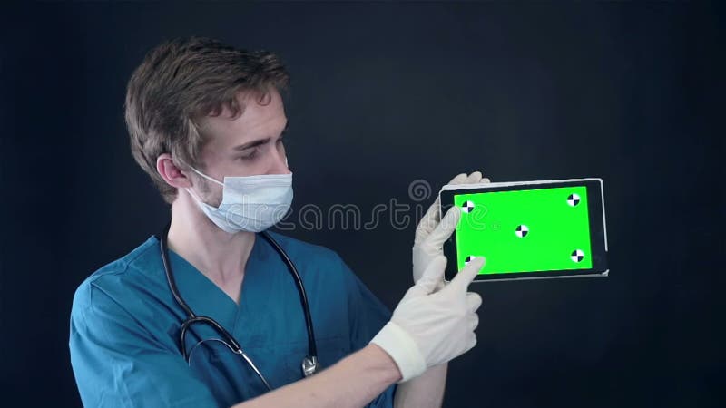 Professional Doctor Working with X-ray Scan and Tablet with Green ...