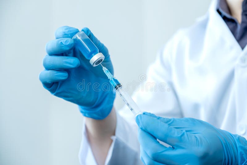 Professional Doctors Perform Testing and Analyzing Samples of Vaccines ...