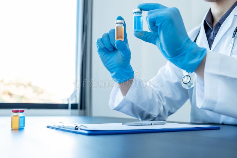 Professional Doctors Perform Testing and Analyzing Samples of Vaccines ...