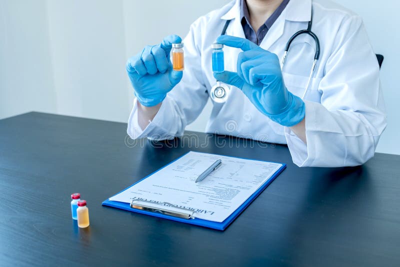 Professional Doctors Perform Testing and Analyzing Samples of Vaccines ...