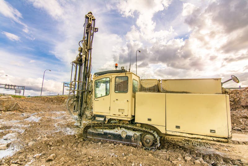 Professional Drilling Rig Doing a Geotechnical Study of the Terrain ...