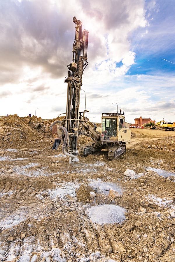 Professional Drilling Rig Doing a Geotechnical Study of the Terrain ...
