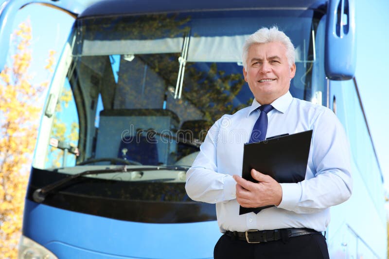 Professional Driver with Clipboard Near Bus Stock Image - Image of ...