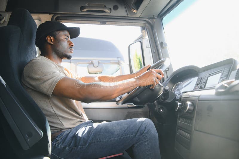 Professional Driver Sitting in Truck Cabin and Driving Stock Photo ...