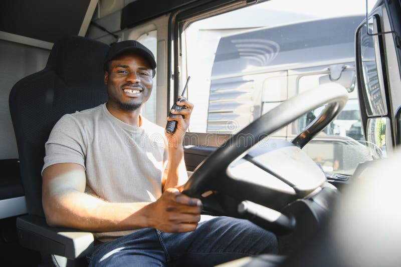 Professional Driver Sitting in Truck Cabin and Driving Stock Photo ...