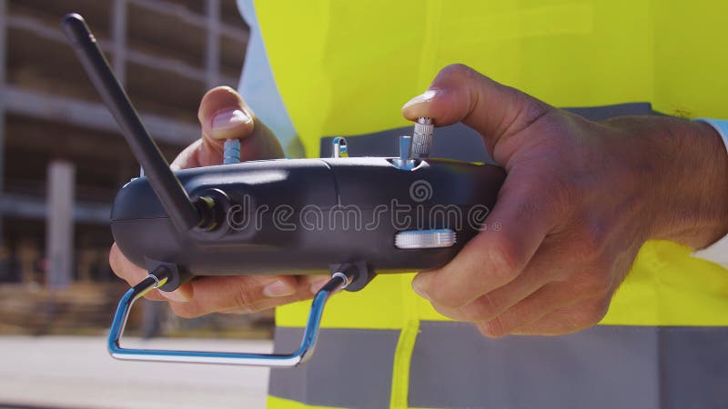 Professional Drone Operator in Virtual Reality Helmet Standing in Front ...
