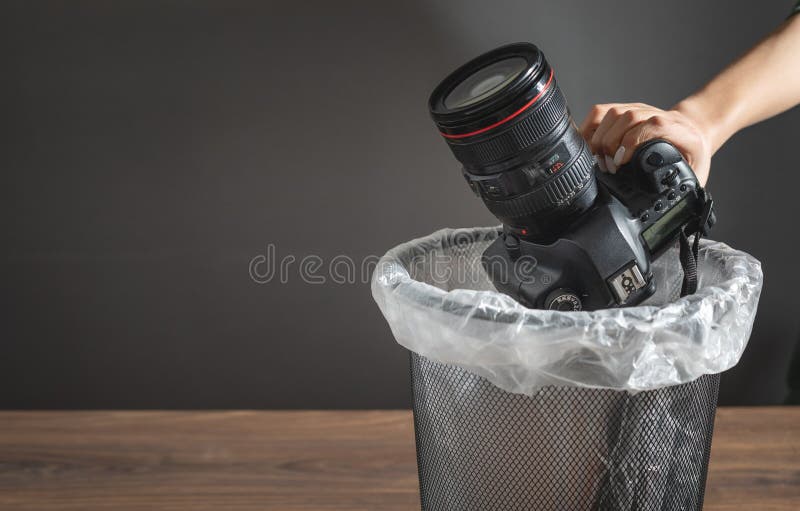 Professional Dslr Camera and Trash Can Stock Photo - Image of ...