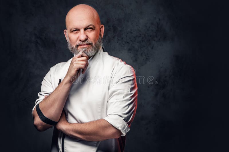 Professional Elderly Chef Dressed in Uniform Against Dark Background ...