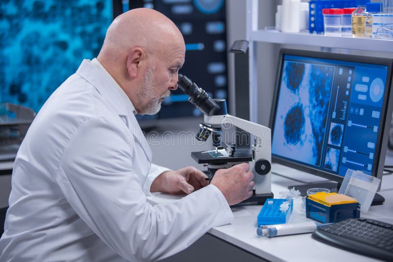 Elderly Professor is Doing a Science Experiment in a Modern Laboratory ...