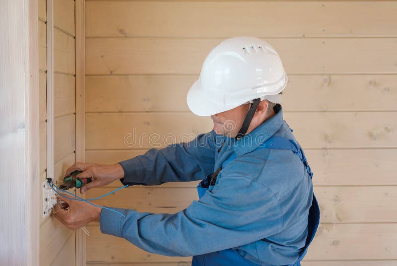 Professional Electrical Engineer Performs Installation of Electrical ...