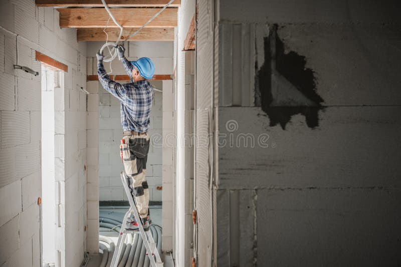 Professional Electrician Installing Electric System Stock Photo - Image ...