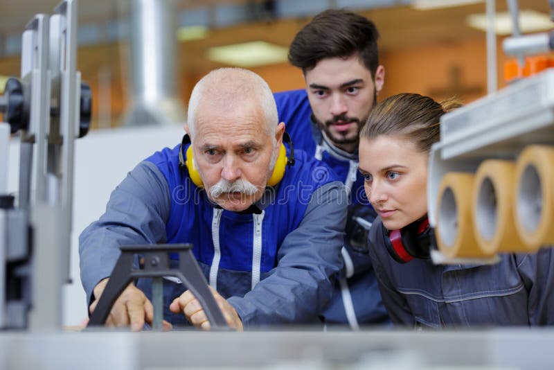 Professional Electrician with Students on Construction Site Stock Image ...