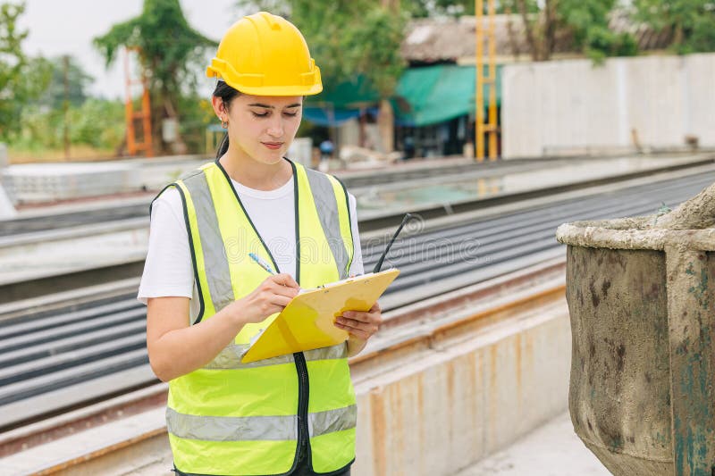Professional Engineer Female Working in Concrete Precast Plant Factory ...