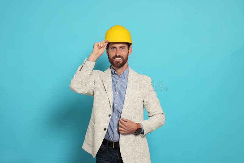 Professional Engineer in Hat on Light Blue Background Stock Image ...