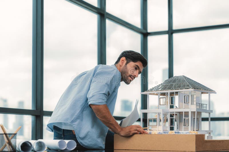 Professional Engineer Inspect Modern House Model with Skyscraper View ...