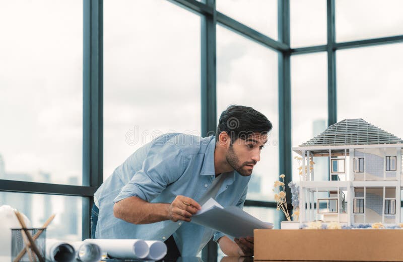 Professional Engineer Inspect Modern House Model with Skyscraper View ...