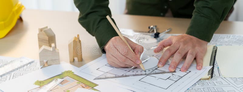 Professional Engineer Working on Architectural Project at Studio ...